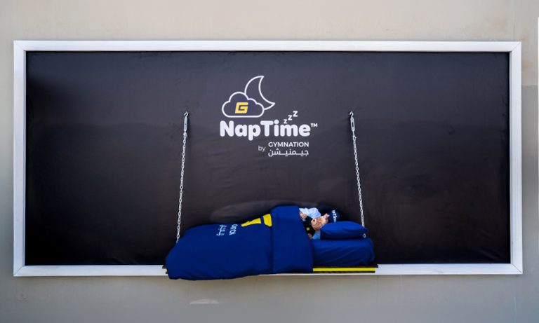 GymNation takes ‘Nap Time’ to the streets with a sleeping billboard in ...